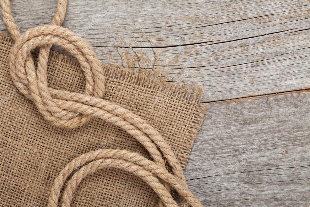 Ship rope on wooden texture background — Stock Photo © karandaev #46238575