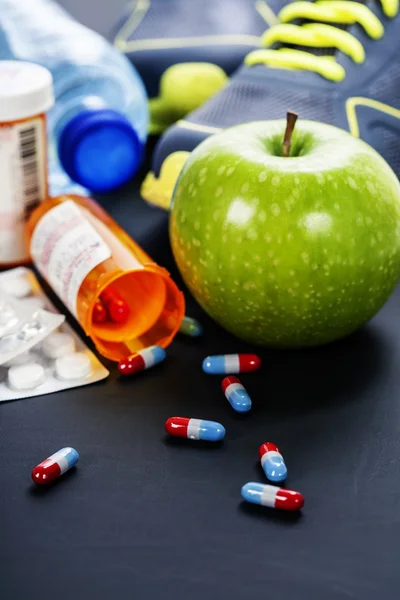 Different tools for sport and pills - Stock Image - Everypixel