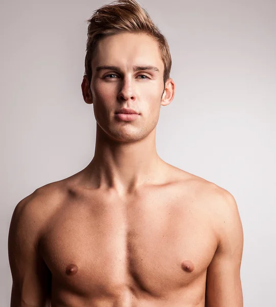 Attractive young undressed man model. Stock Photo by ©innervision 14487531