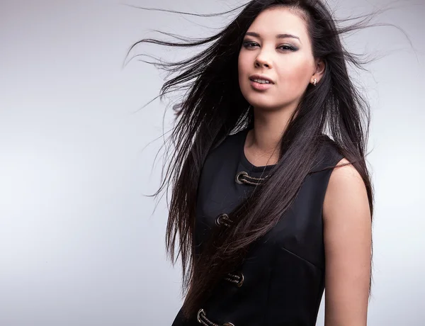 Young Beautiful Eastern Girl In Elegant Black Dress Stock Photo by ...