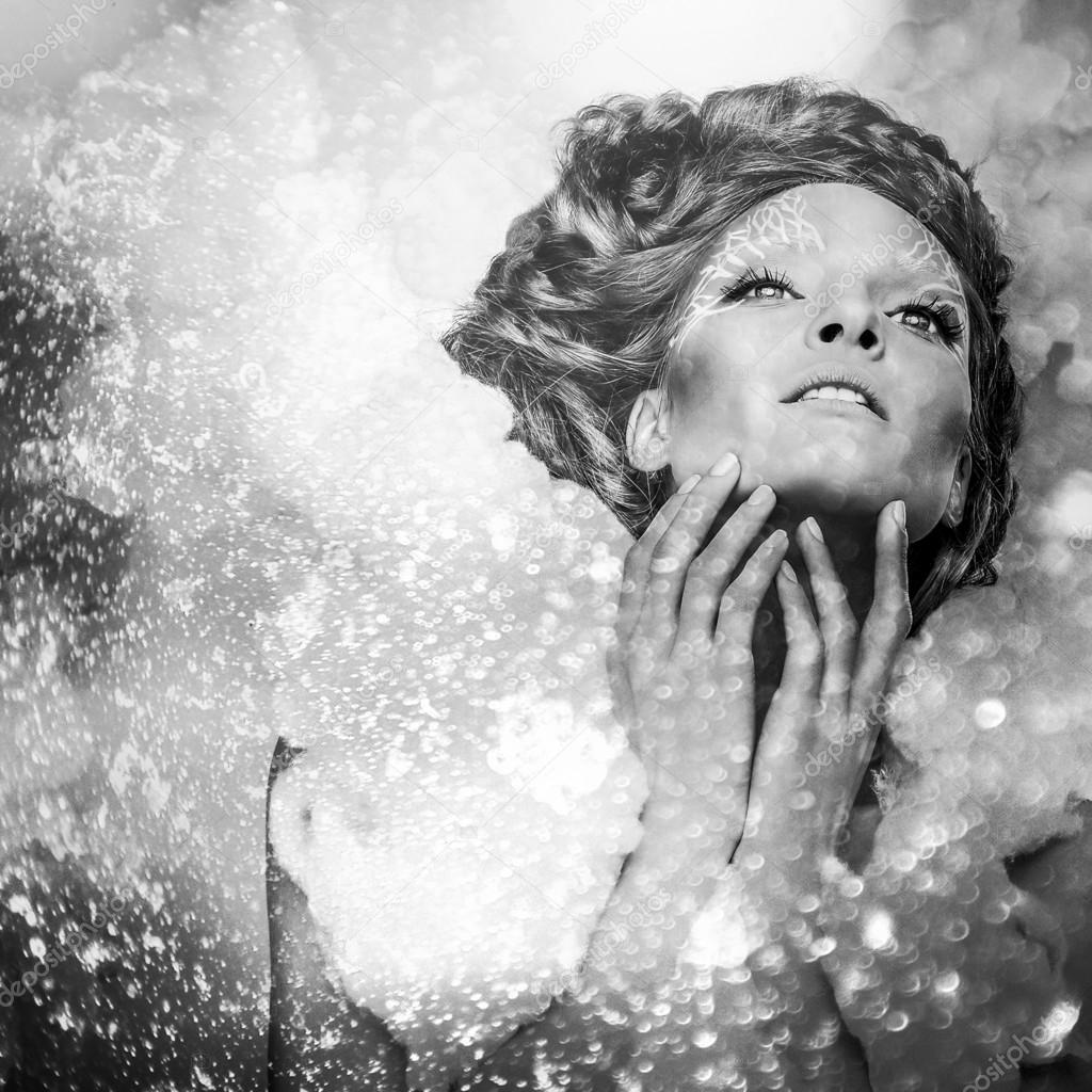 Romantic beauty with magnificent hair wandering in clouds. Digital ...