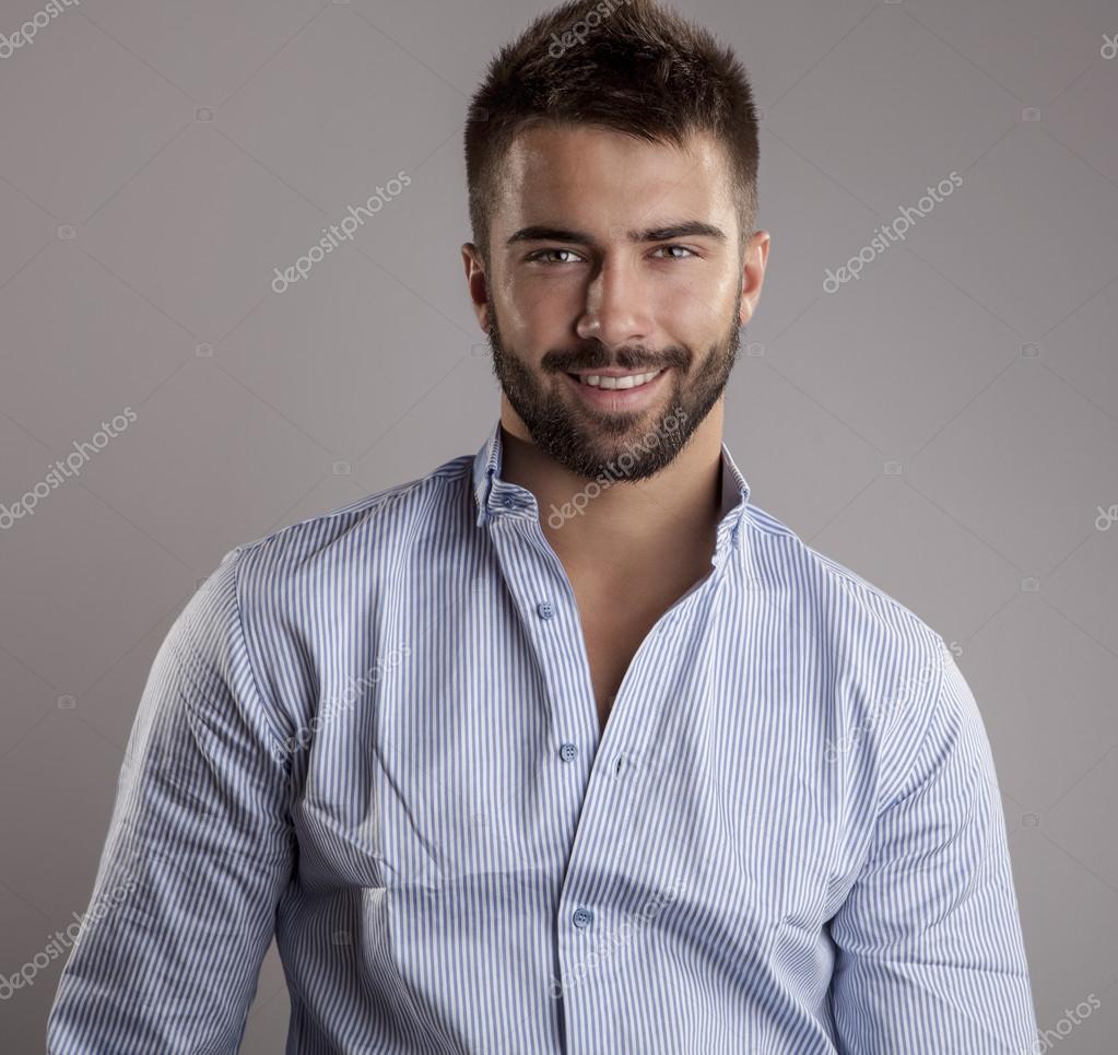 Elegant young handsome man. Studio fashion portrait. Stock Photo by ...