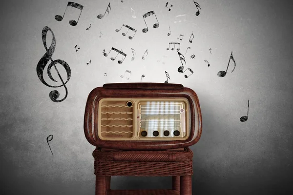 Vintage music notes with old radio — Stock Photo © alphaspirit #35774803