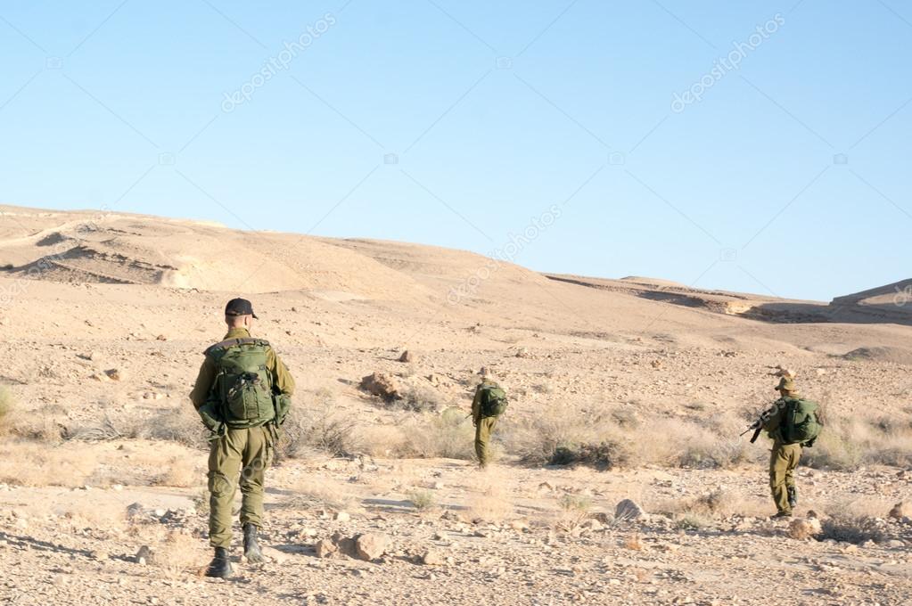 Soldiers patrol in desert — Stock Photo © javax_ber #51560675