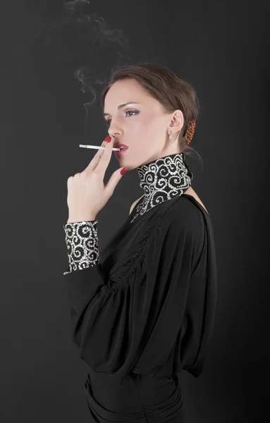 Model smoking cigarette Stock Photos, Royalty Free Model smoking ...