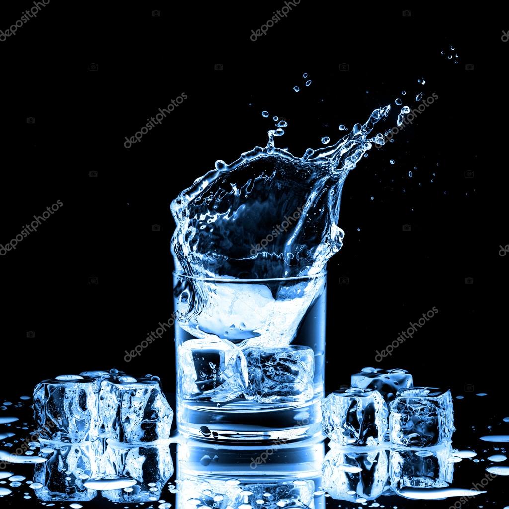 Ice cube dropped, isolated on black Stock Photo by ©smaglov 21810673