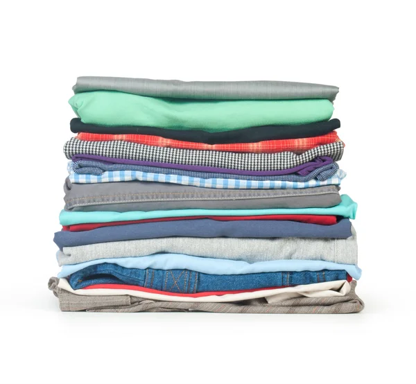Big Stack Of Folded Clothes Isolated On White Stock Photo by ...