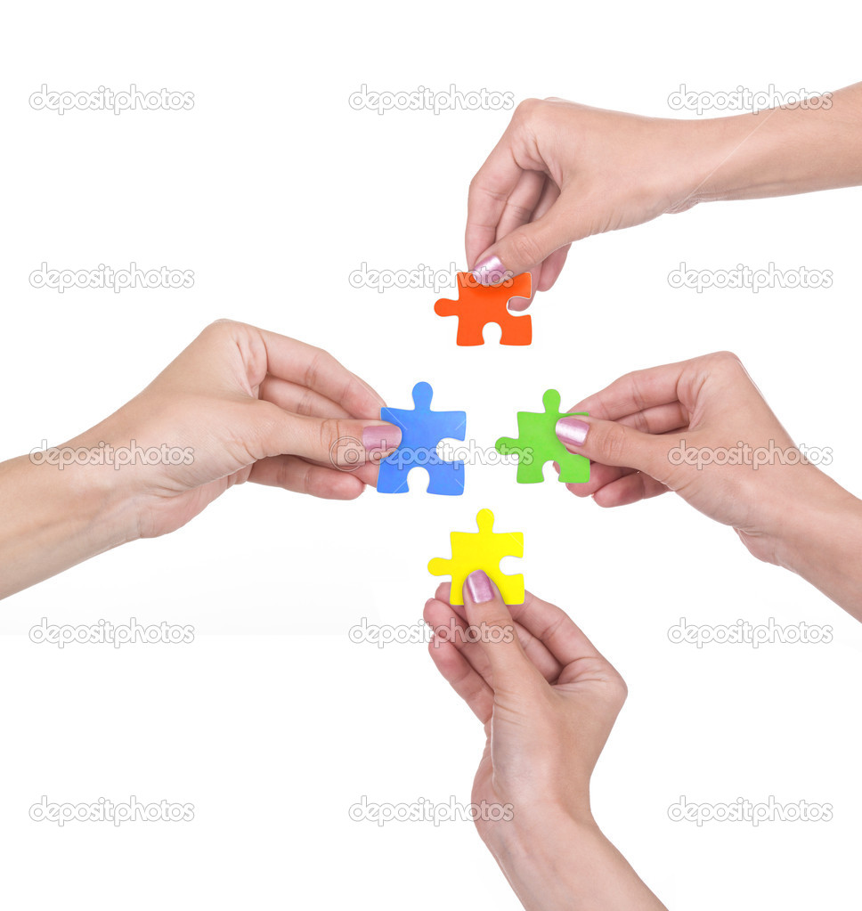 Hands and puzzle Stock Photo by ©urfingus 37811867