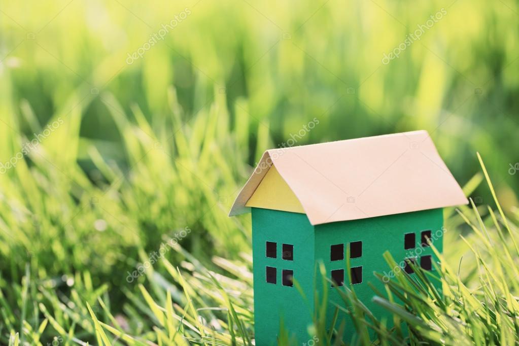 Green paper house on spring grass Stock Photo by ©Kruchenkova 45929245