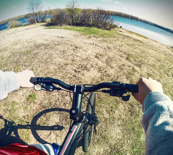 Biker hands holding the steering wheel - Stock Image - Everypixel