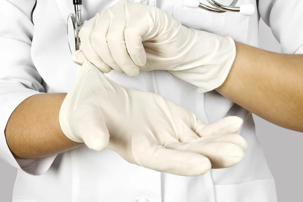 Putting on gloves Stock Photos, Royalty Free Putting on gloves Images ...