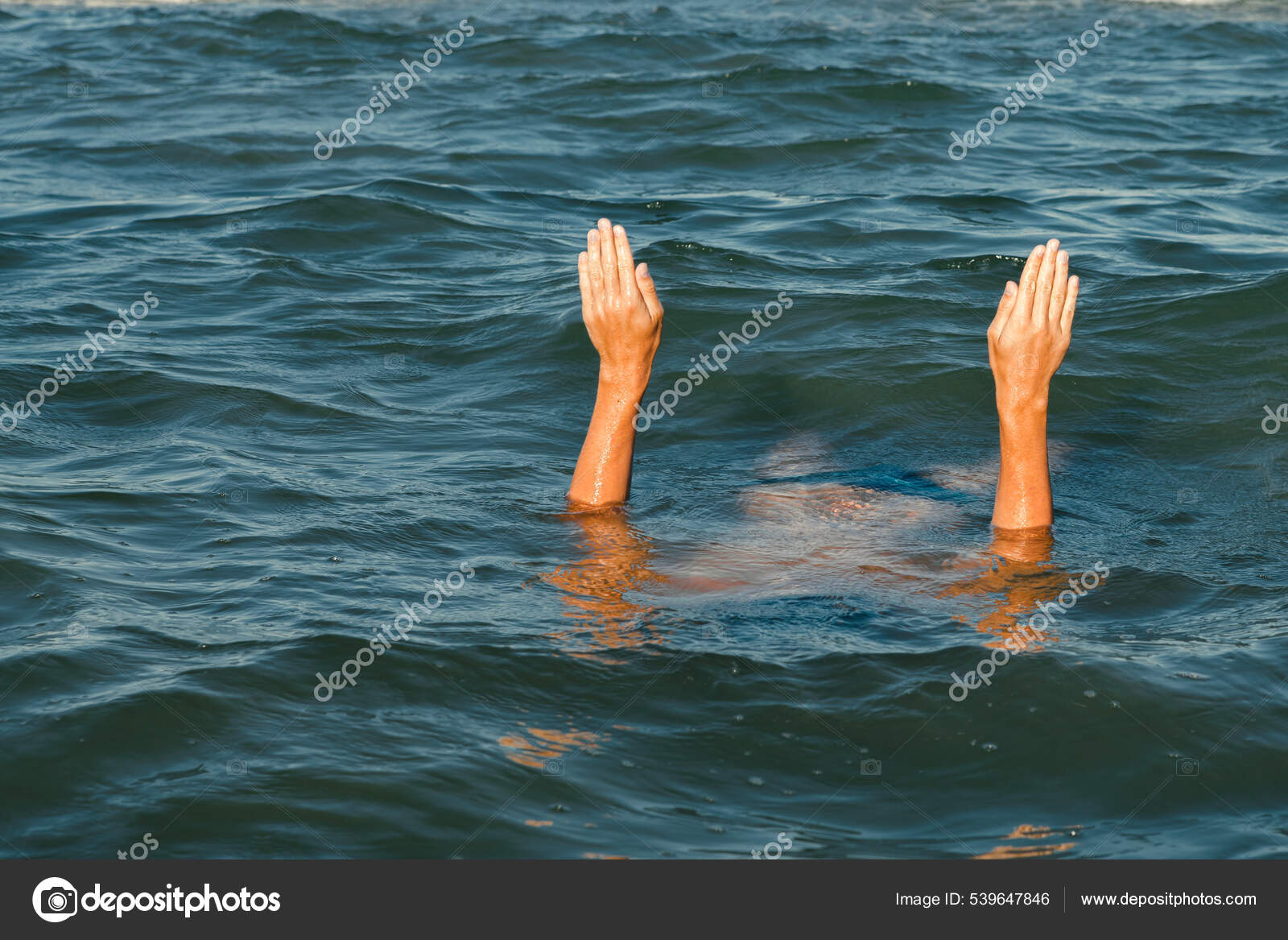 Person Sinking In Water