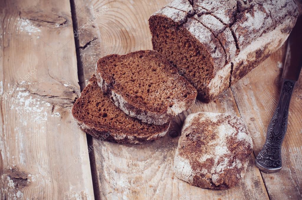 Rustic wholemeal rye bread — Stock Photo © manera #38876771