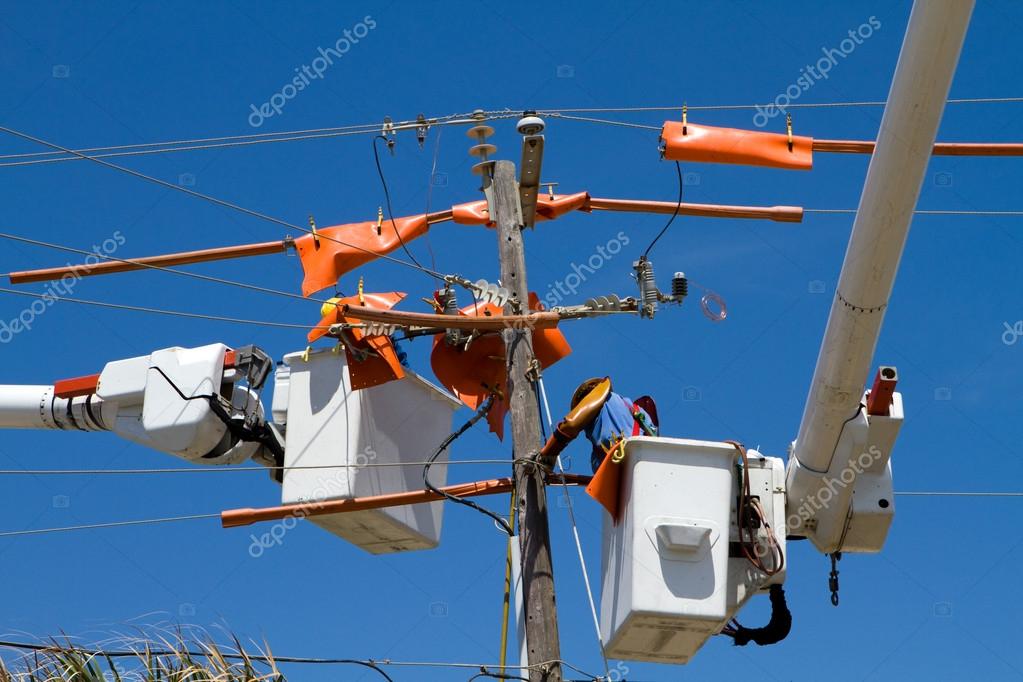 Working On Power Lines Stock Photo by ©sframe 15623105