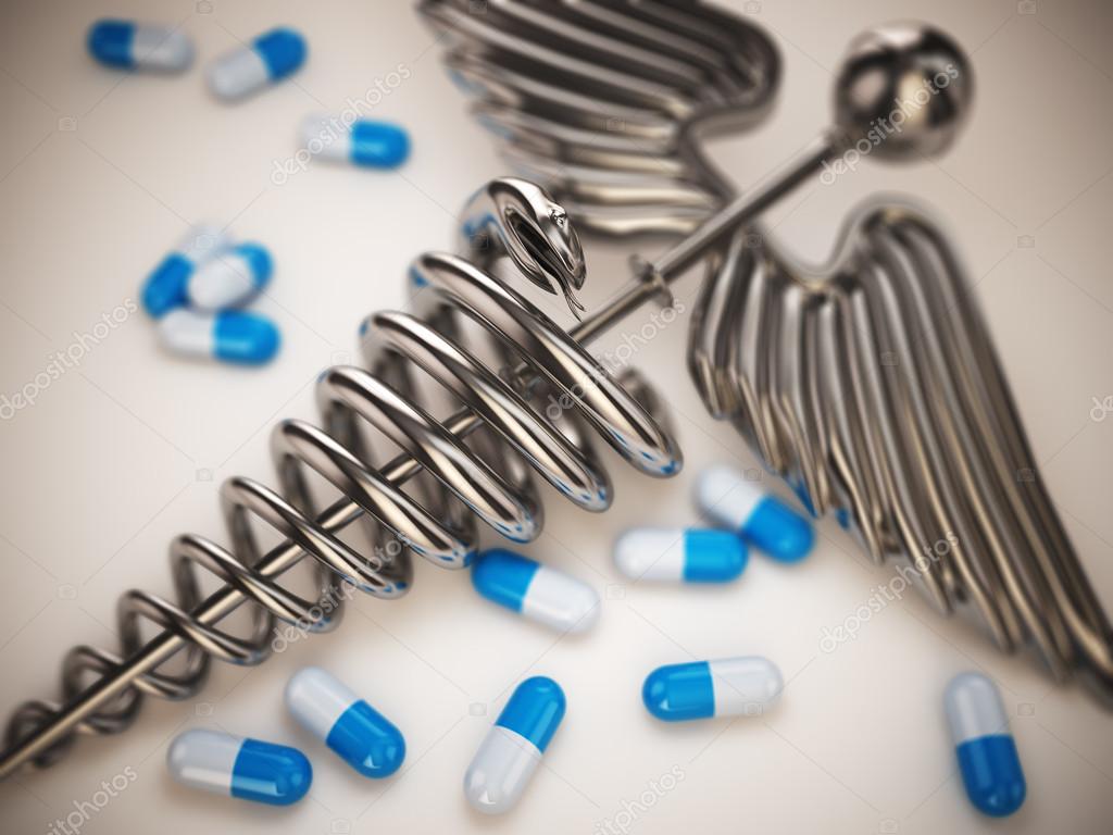 Pills and caduceus pharmacy symbol. Stock Photo by ©maxxyustas 35971795
