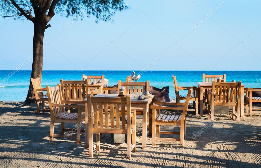 Cafe on a tropical beach Stock Photo by ©Iryna_Rasko 25171483
