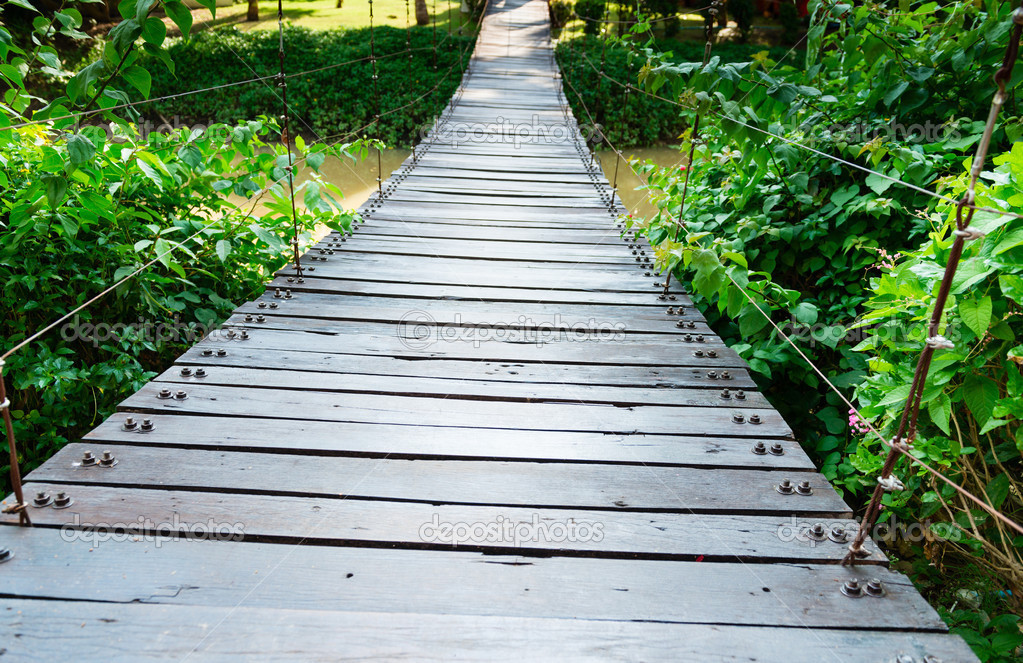 Wooden long rope bridge — Stock Photo © Iryna_Rasko #51421943
