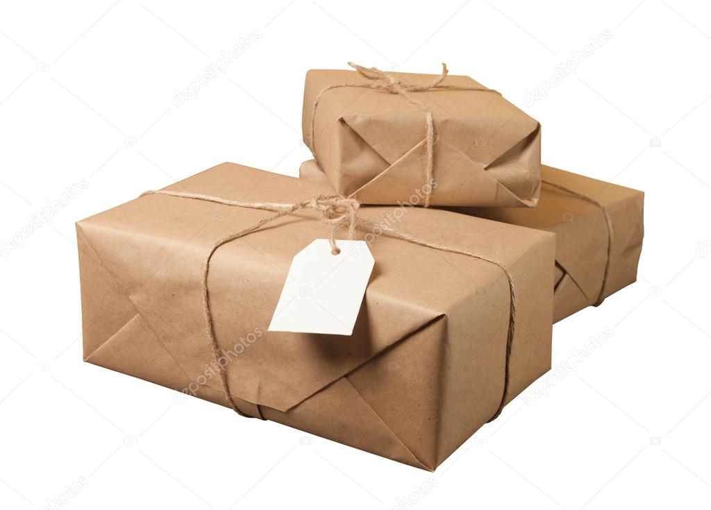 Parcel wrapped with brown paper tied with rope isolated on white ...