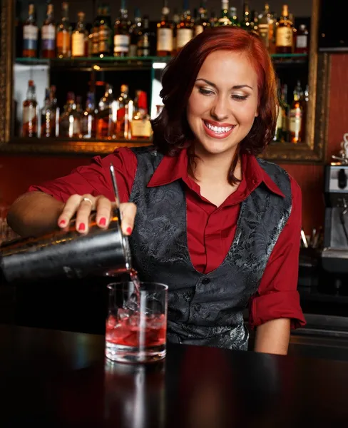 Smiling barmaid standing Stock Photo by ©Wavebreakmedia 114891072