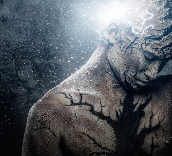 Man with conceptual spiritual body art Stock Photo by ©nejron 68253005