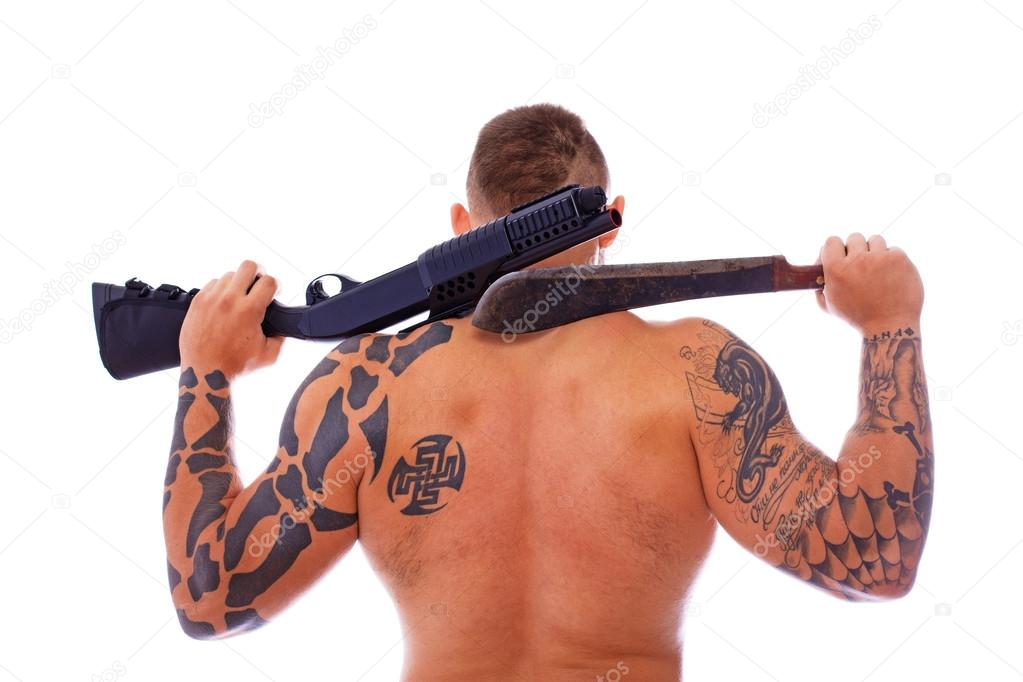 Punk with a rifle and a knife — Stock Photo © fxquadro #13776934