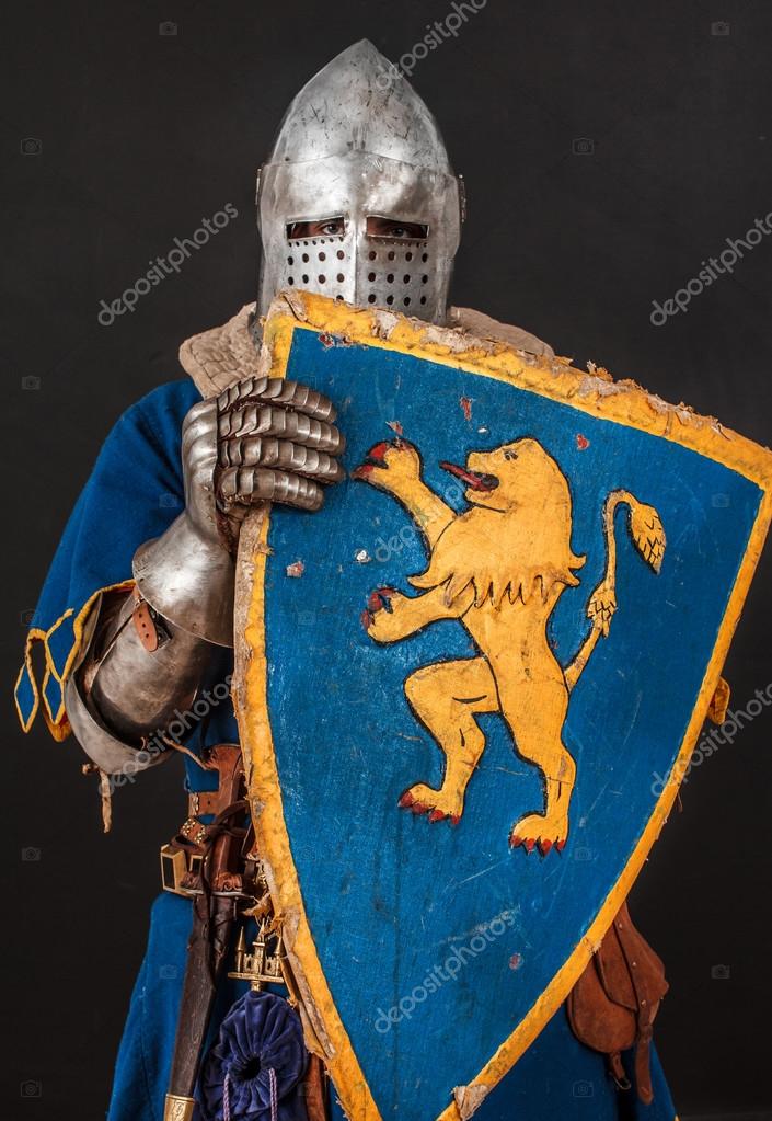Knight in blue in hiding behind his shield Stock Photo by ©fxquadro ...