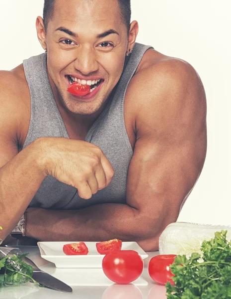 Man eating vegetables Stock Photo by ©fxquadro 43742015