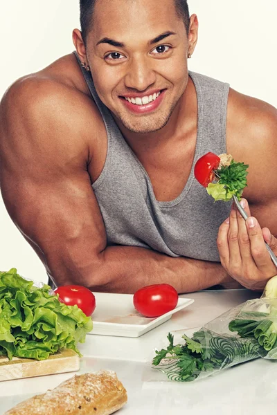 Man eating vegetables Stock Photo by ©fxquadro 43742015
