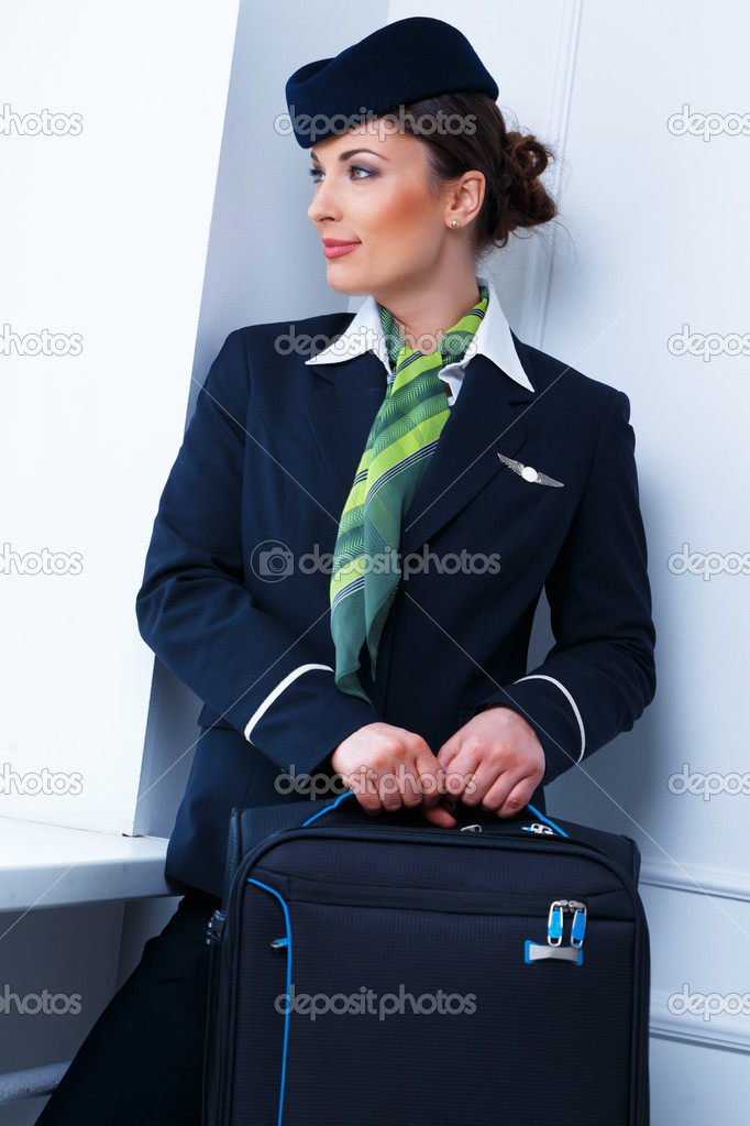 Pretty stewardess Stock Photo by ©fxquadro 46146555