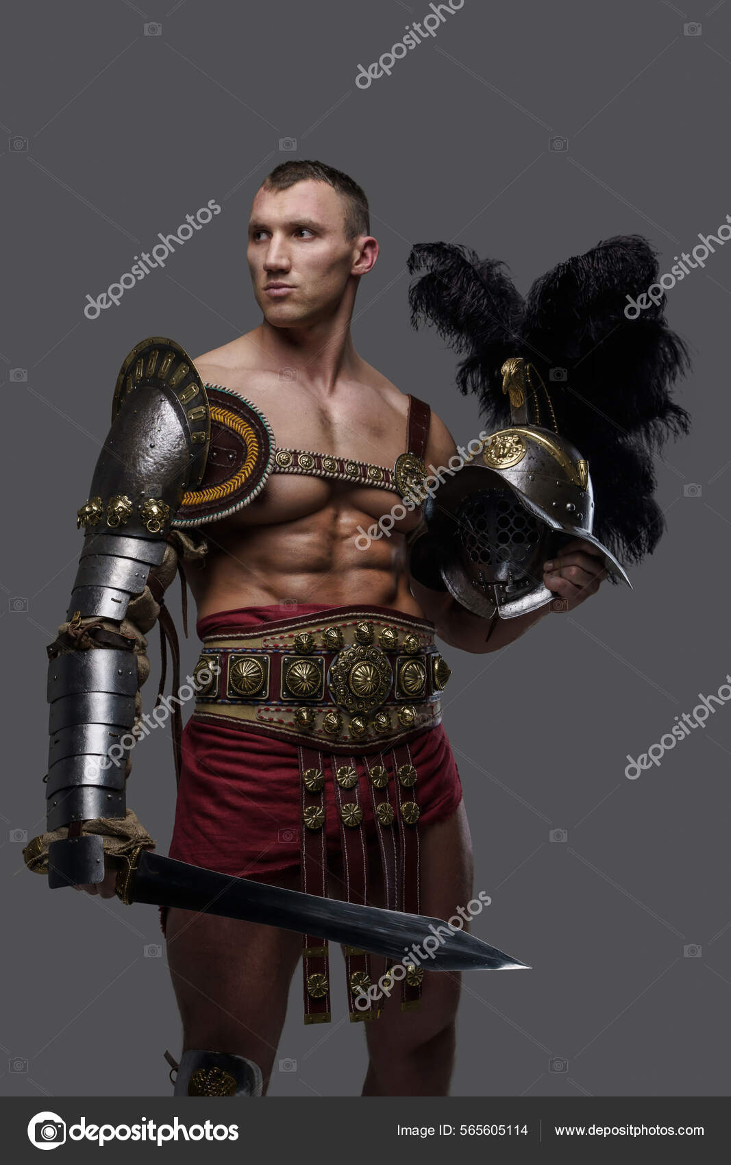 Glorious gladiator with gladius and helmet isolated on grey — Stock ...