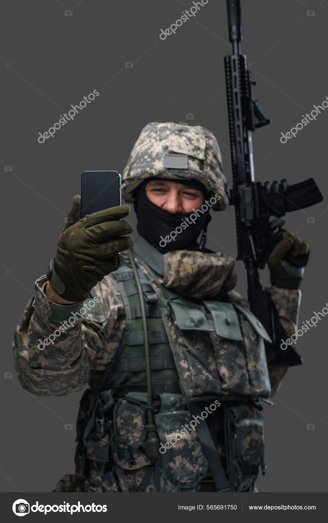 Cheerful military man with rifle and smart phone — Stock Photo ...
