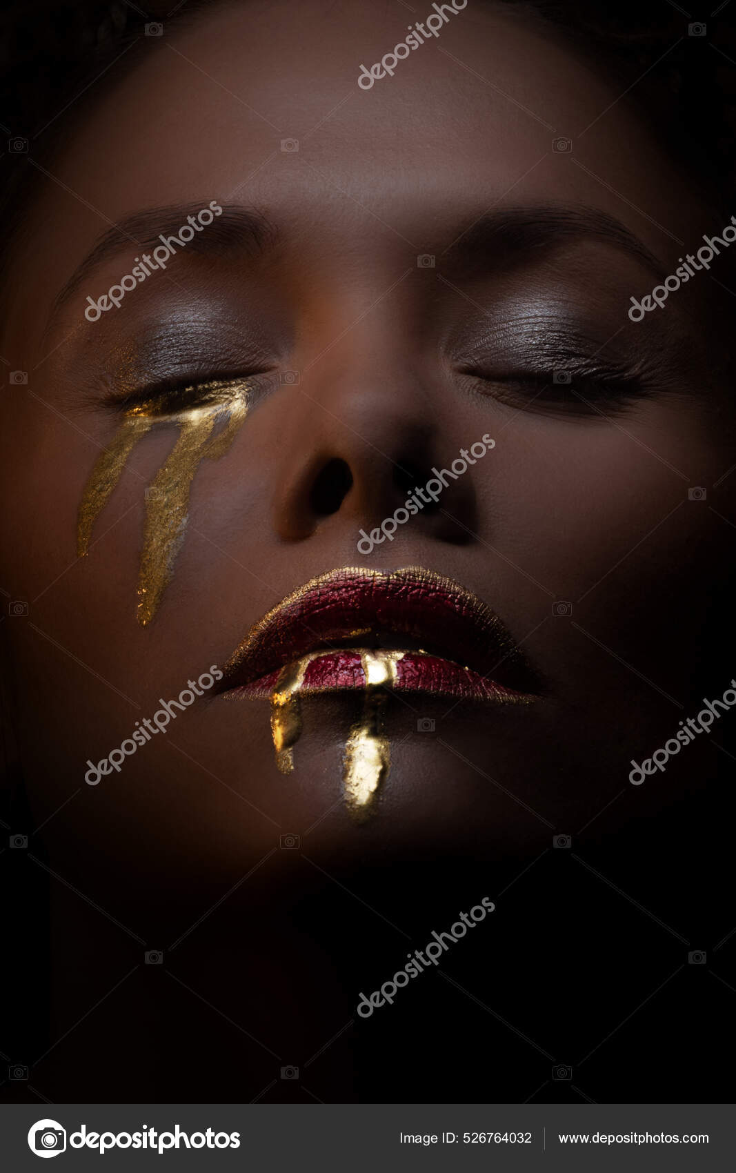 Gold on the skin, face art and creative makeup, gold as tears and blood ...
