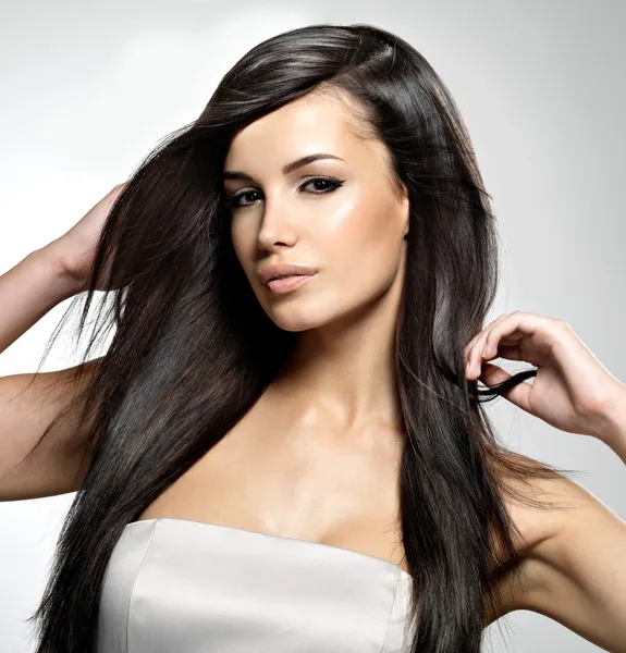 Beautiful woman with long straight hair — Stock Photo © valuavitaly ...
