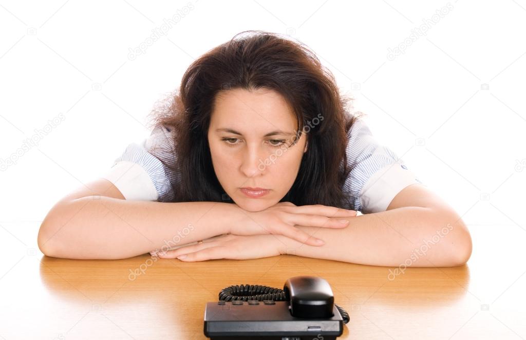 Young sad woman with phone — Stock Photo © Irina1977 #41416171