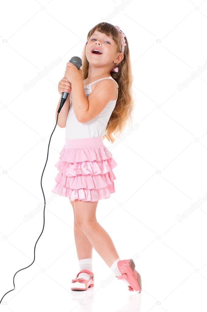 Girl with microphone Stock Photo by ©DenisNata 29838467