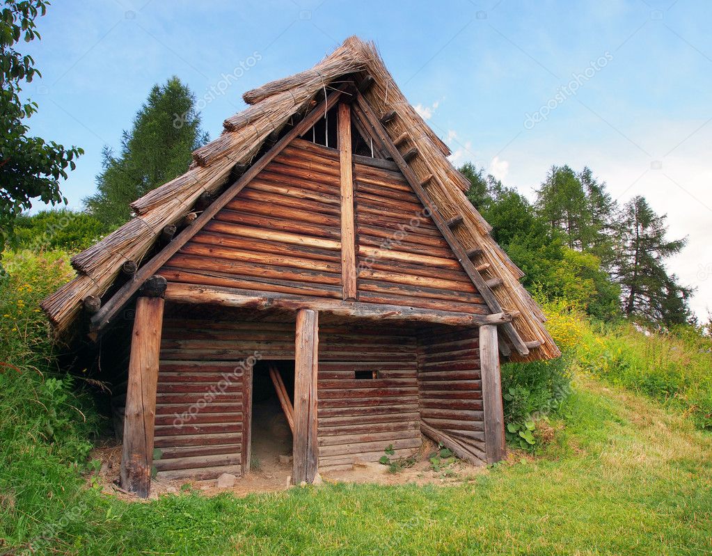 A Celtic log house, Havranok, Slovakia — Stock Photo © jareso #49508483
