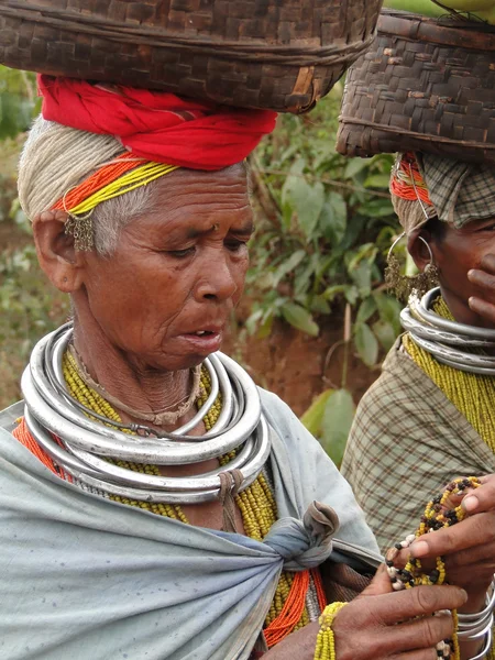 Bonda tribal women pose for portraits on their way to the weekly market ...
