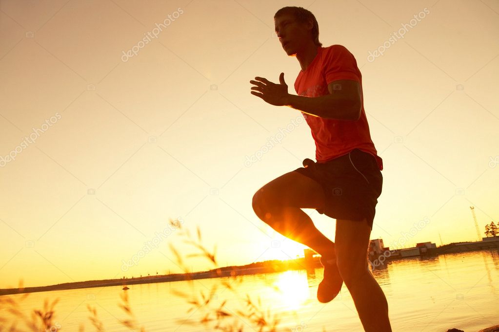Running on sunset — Stock Photo © yanlev #13806400
