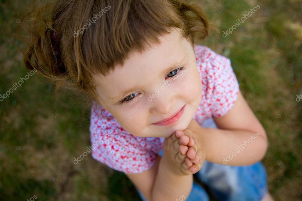 Cute Little Girl Praying Stock Photo by ©yanlev 19261355