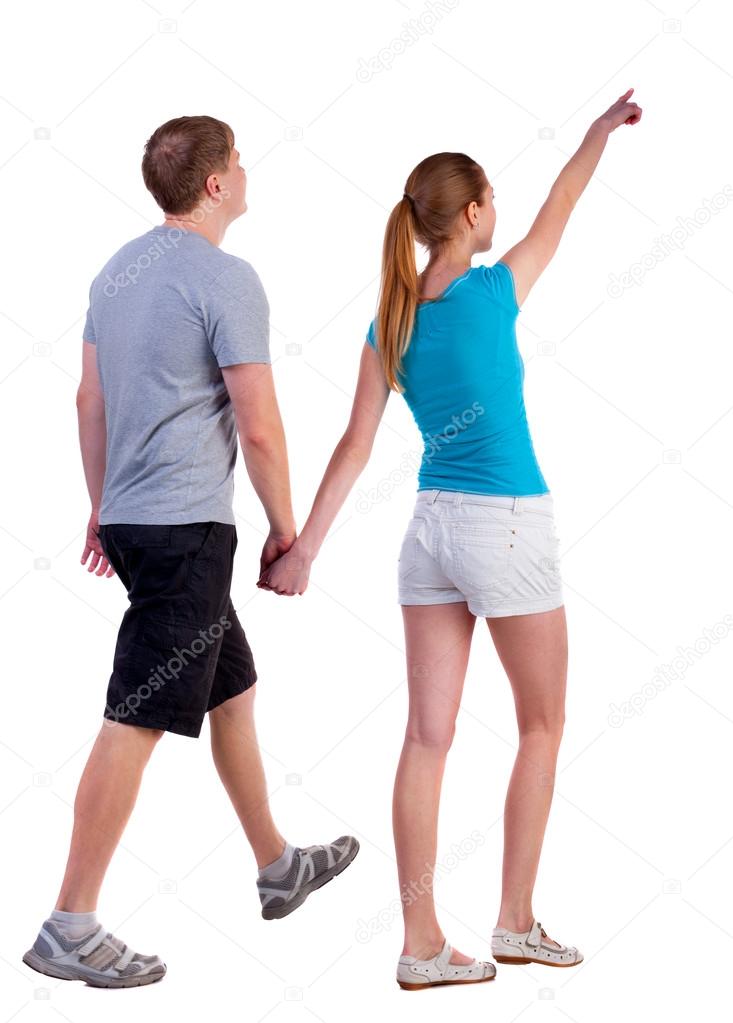 Back view of walking young couple Stock Photo by ©ghoststone 22267039