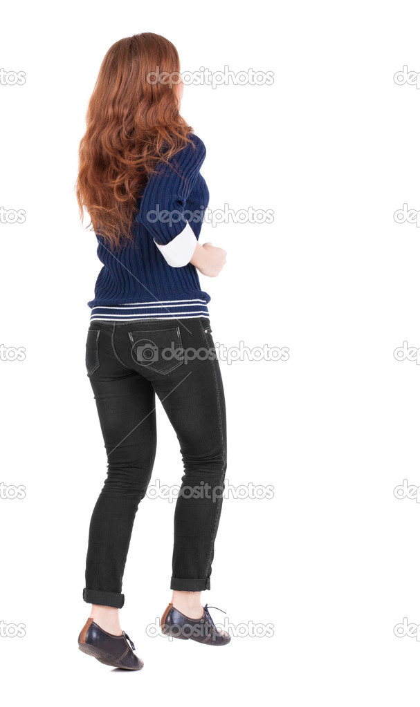 Back view of jumping woman in jeans. Stock Photo by ©ghoststone 28258929