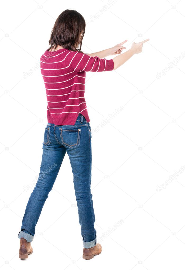 Back view of pointing woman. Stock Photo by ©ghoststone 39360305