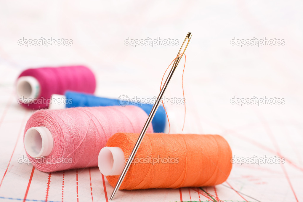 Spool of thread and needle. Sew accessories. Stock Photo by ©natika ...