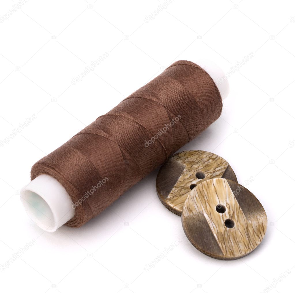 Brown spool of thread Stock Photo by ©natika 23558001