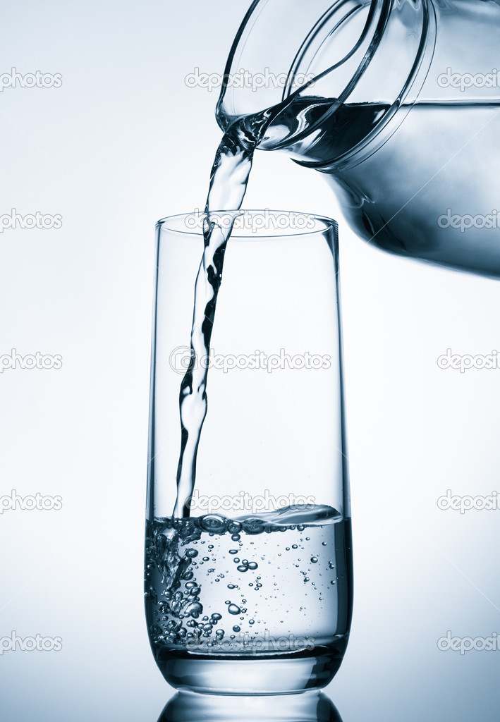 Pouring Pitcher Of Water