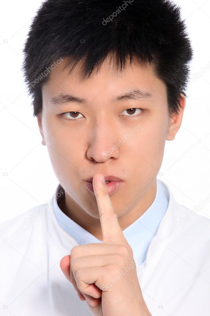 Asian man making a shushing gesture Stock Photo by ©Farina6000 19806681