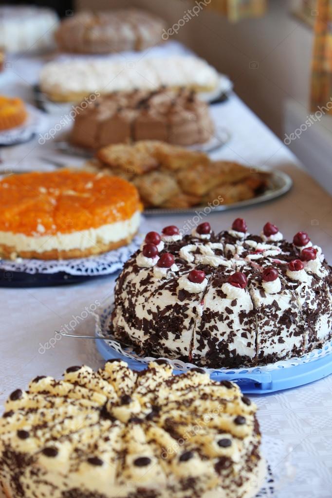 Buffet table with an assortment of cakes — Stock Photo © Farina6000 ...