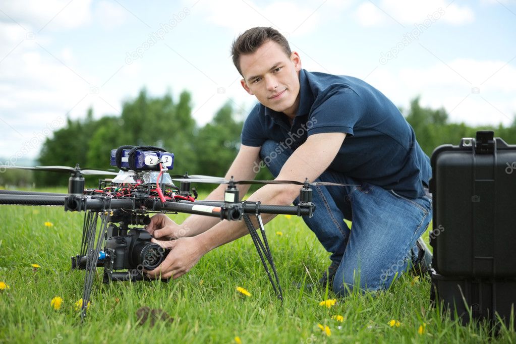 Engineer Setting Camera On Photography Drone — Stock Photo © SimpleFoto ...