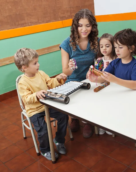 Children playing musical instruments Stock Photos, Royalty Free ...
