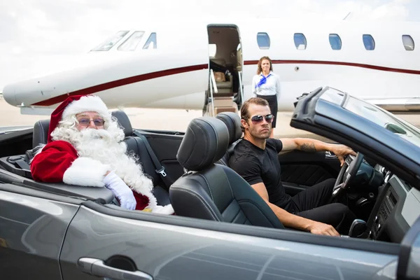 Santa Leaning On Private Jet At Airport Terminal — Stock Photo ...